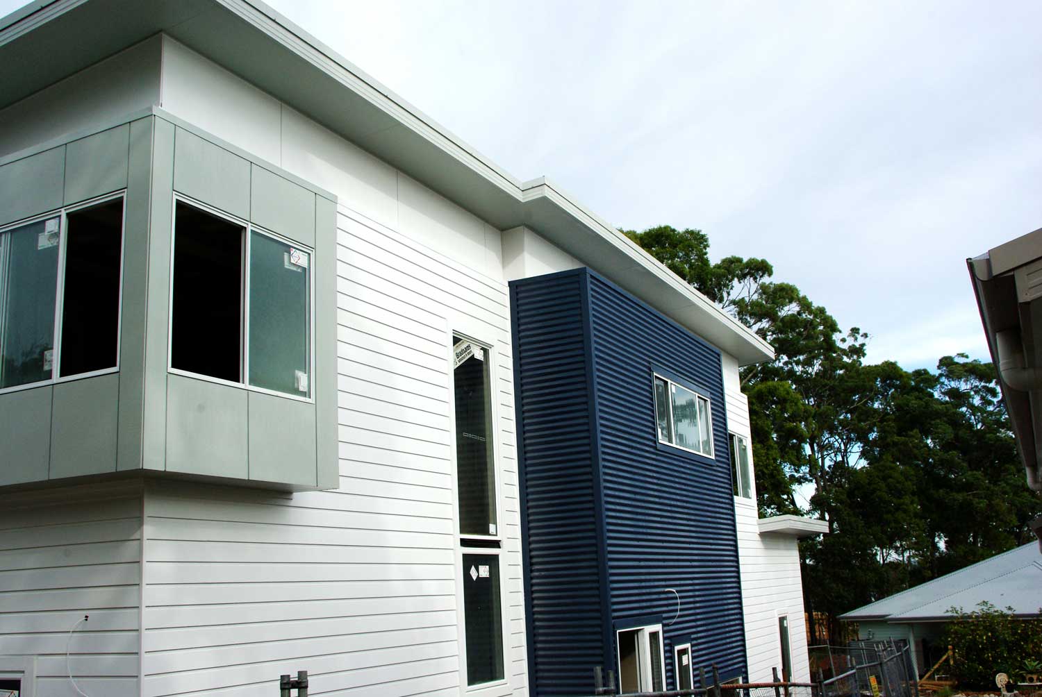 Wall Cladding - CnF Roofing Specialists